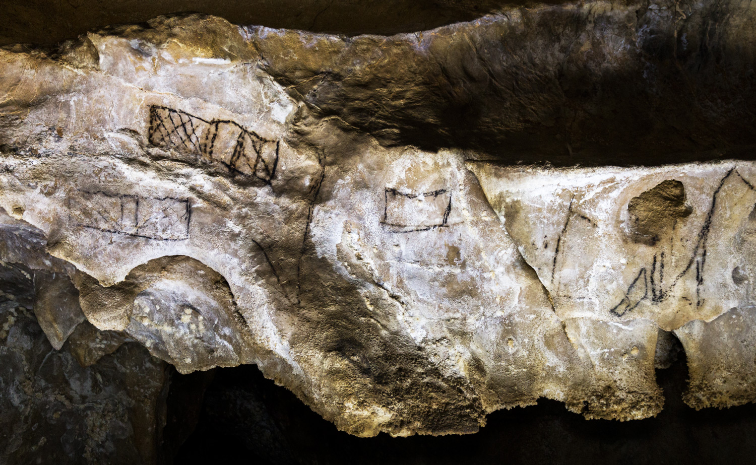 What the mysterious symbols made by early humans can teach us about how ...